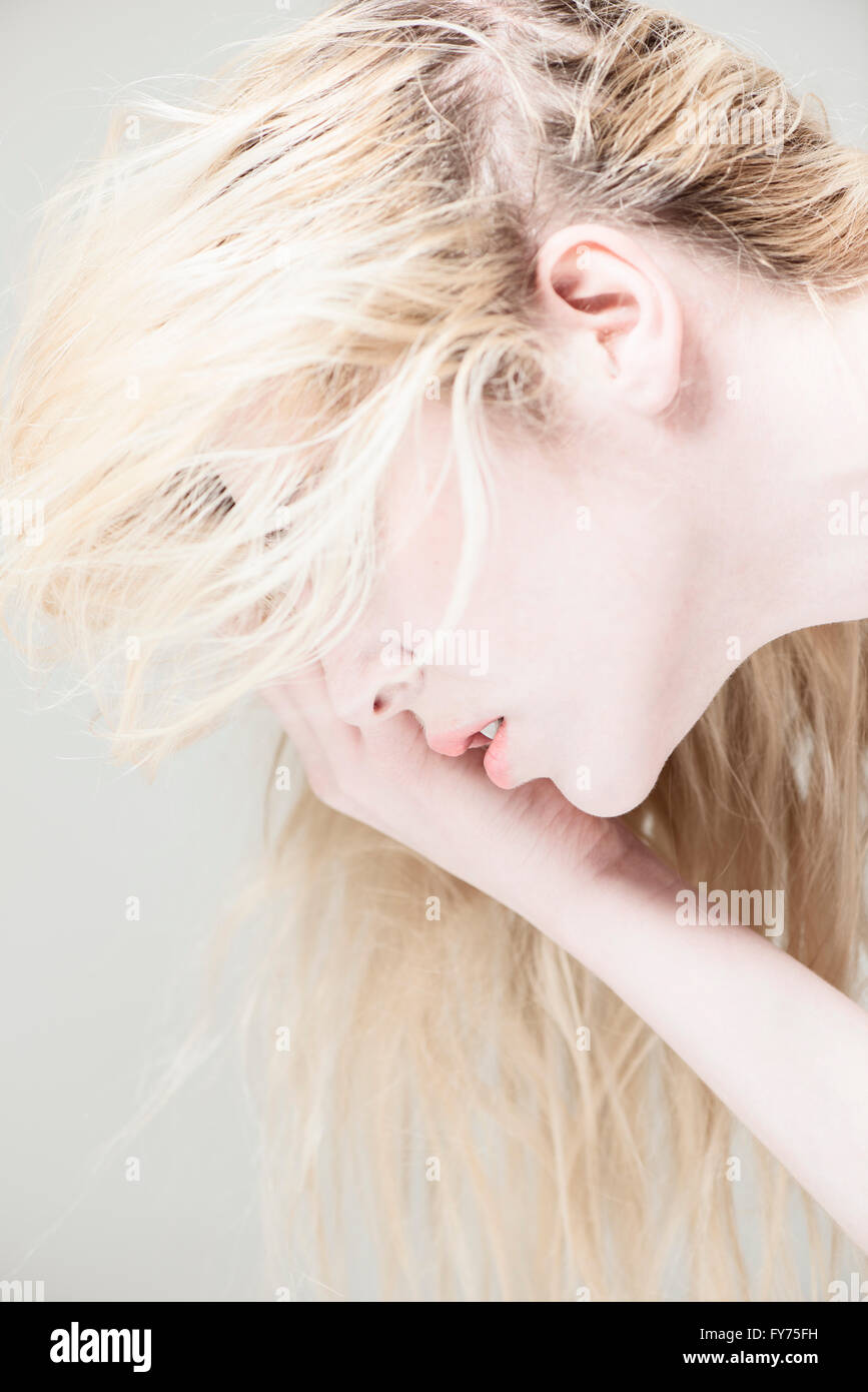 Woman face looking down profile hi-res stock photography and images - Alamy