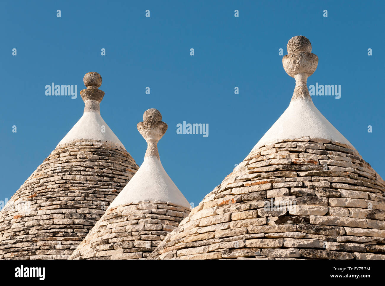 Conical roofs and pinnacles of Trullo houses, Trulli District ...