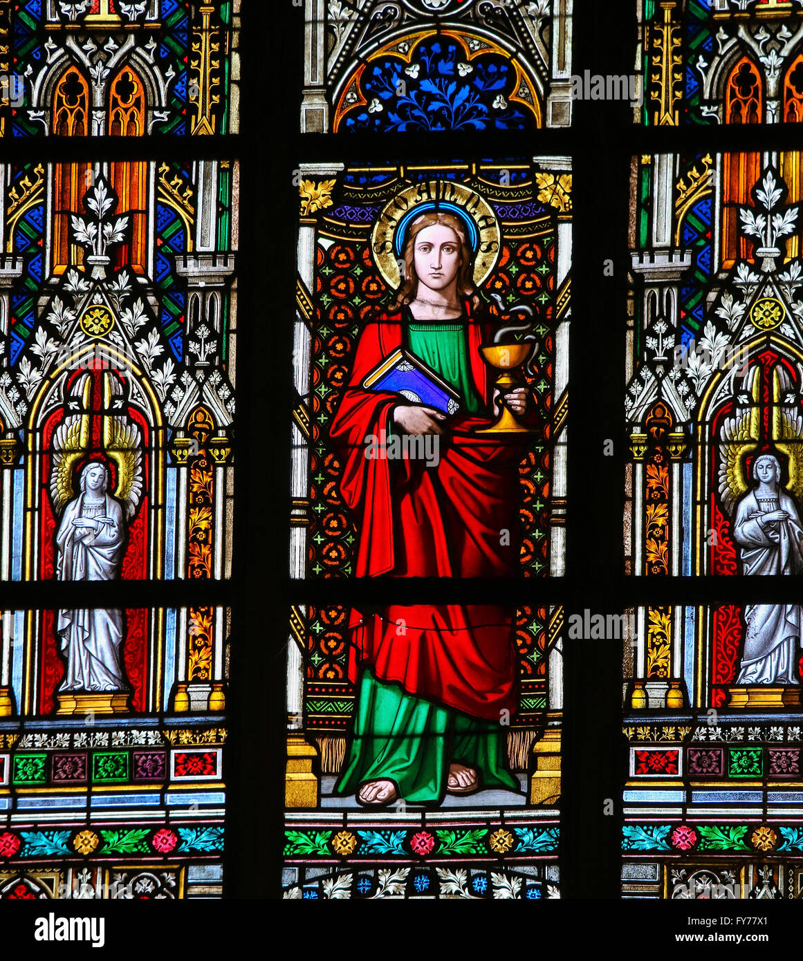 Saint john evangelist stained glass hi-res stock photography and images ...