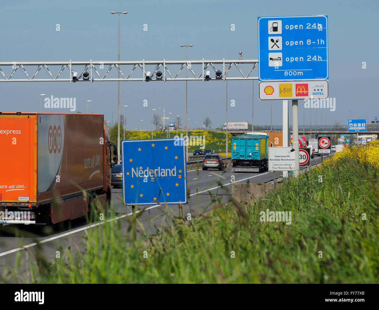 Crossing the border at Hazeldonk, trucks driving into the Netherlands ...