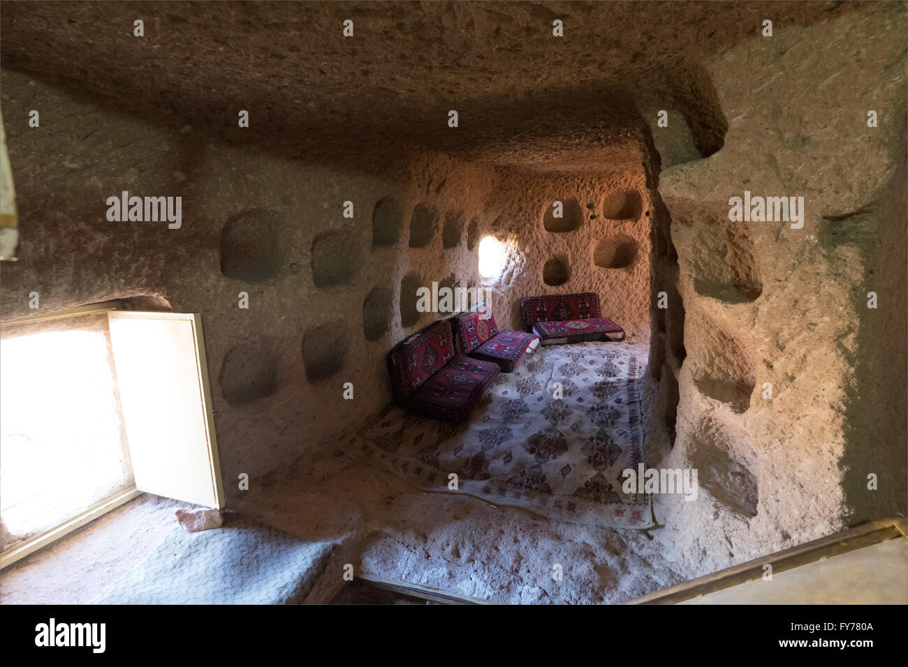 Cave dwelling and columbariums interior at the valley of Uchisar town ...