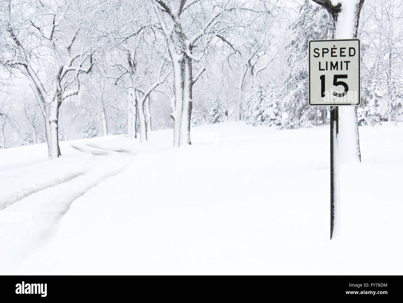 Snow covered speed limit sign hi-res stock photography and images - Alamy