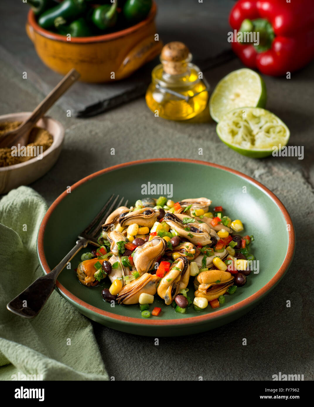 A delicious mexican style mussel salad with black beans, cilantro, red ...