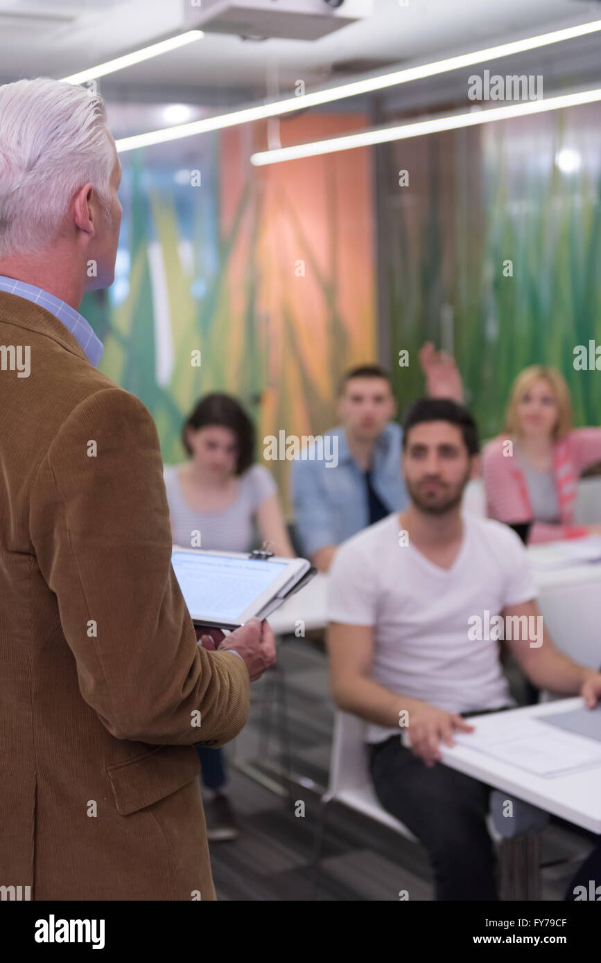 group of students study with professor in modern school classroom Stock ...