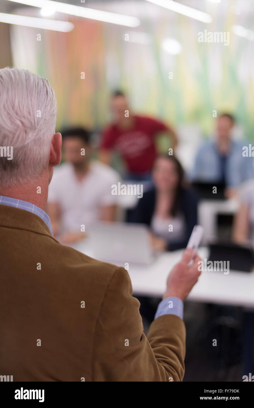 group of students study with professor in modern school classroom Stock ...