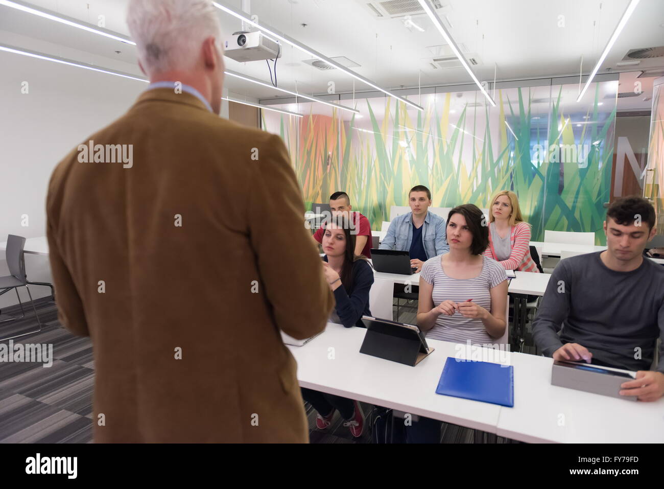 group of students study with professor in modern school classroom Stock ...