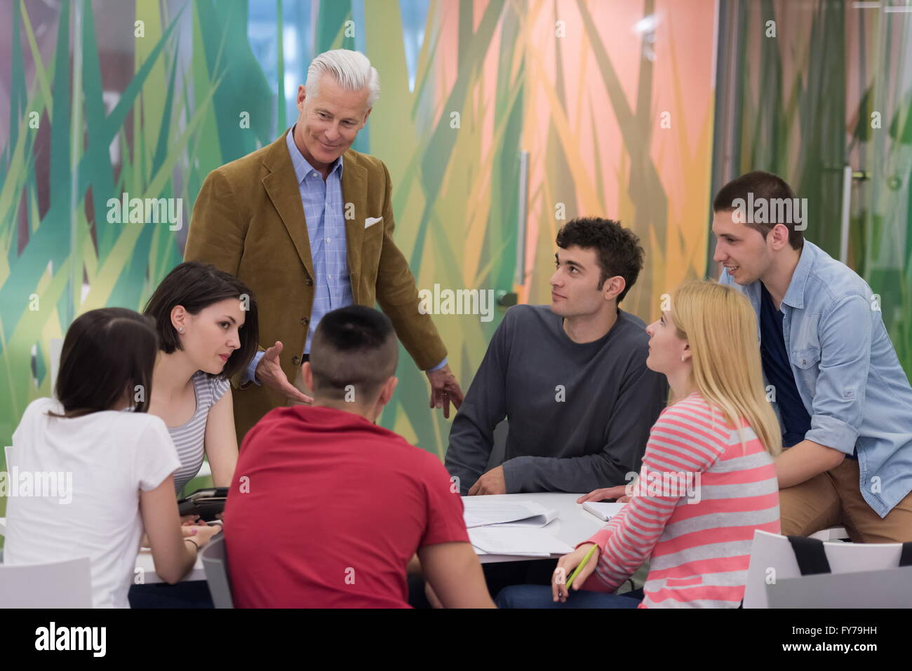 group of students study with professor in modern school classroom Stock ...