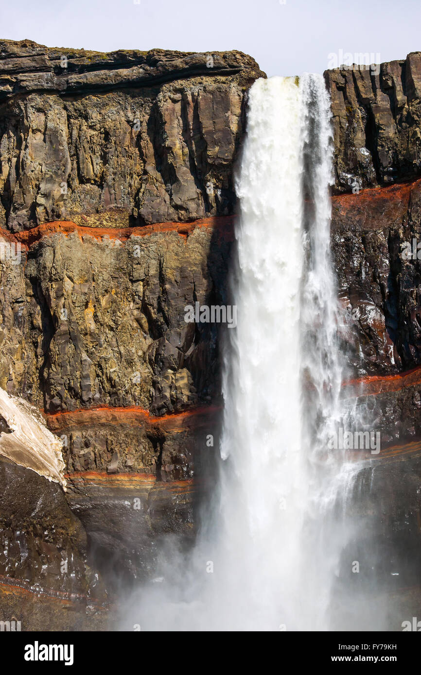 The Hengifoss waterfall in Iceland with red strata stripes Stock Photo ...
