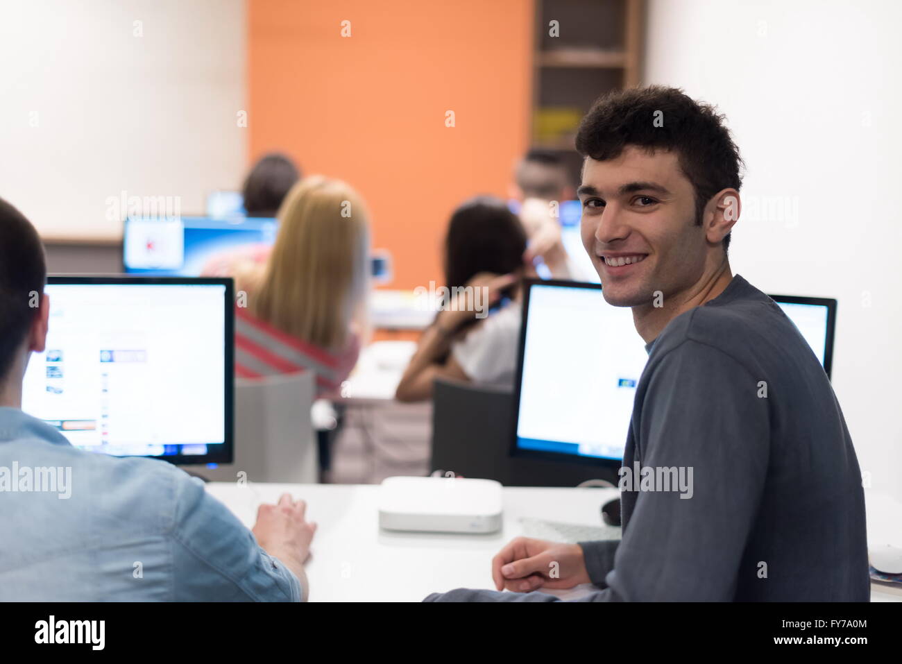 technology students group in computer lab school classroom working on ...