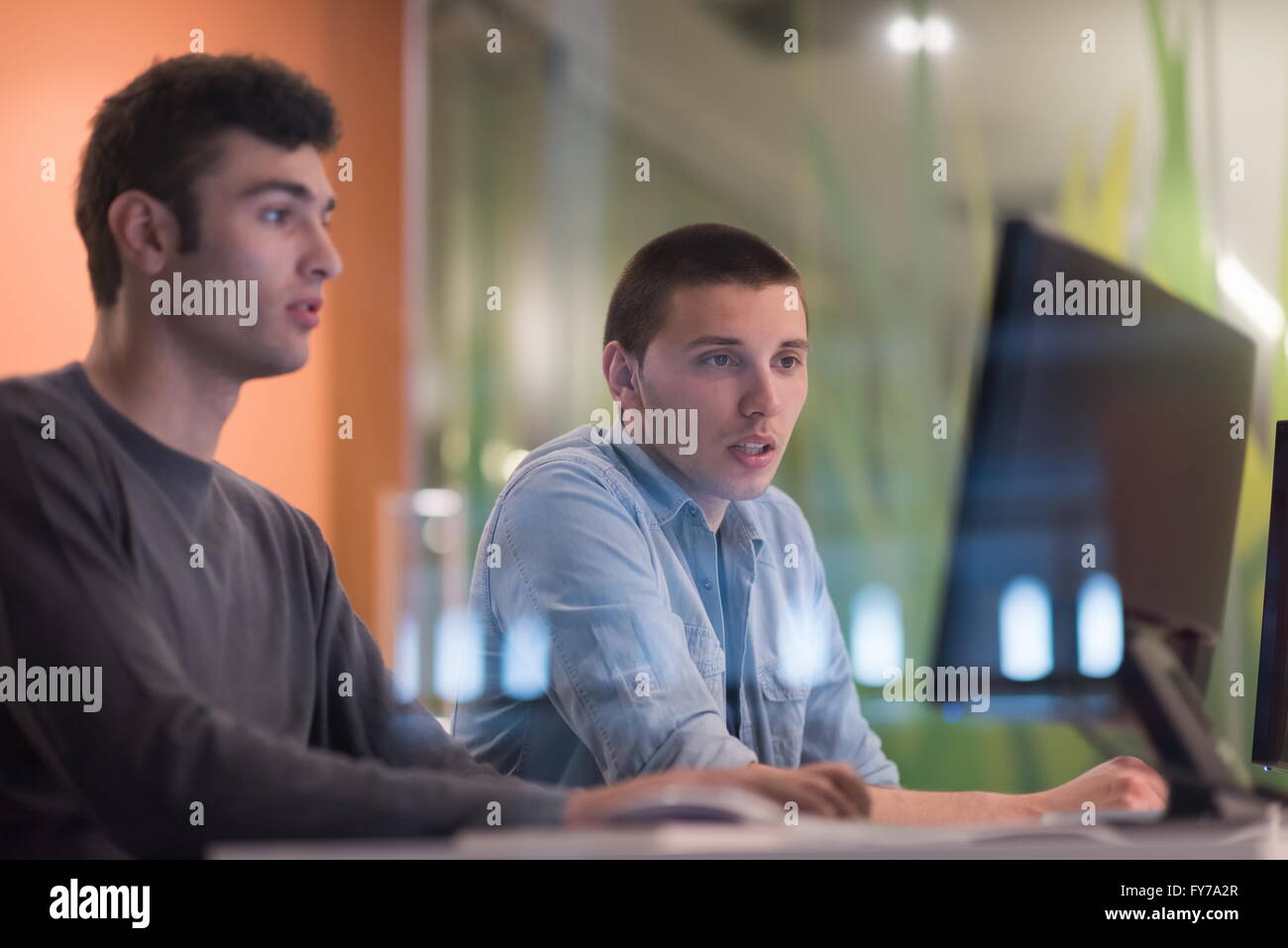 technology students group in computer lab school classroom working on ...