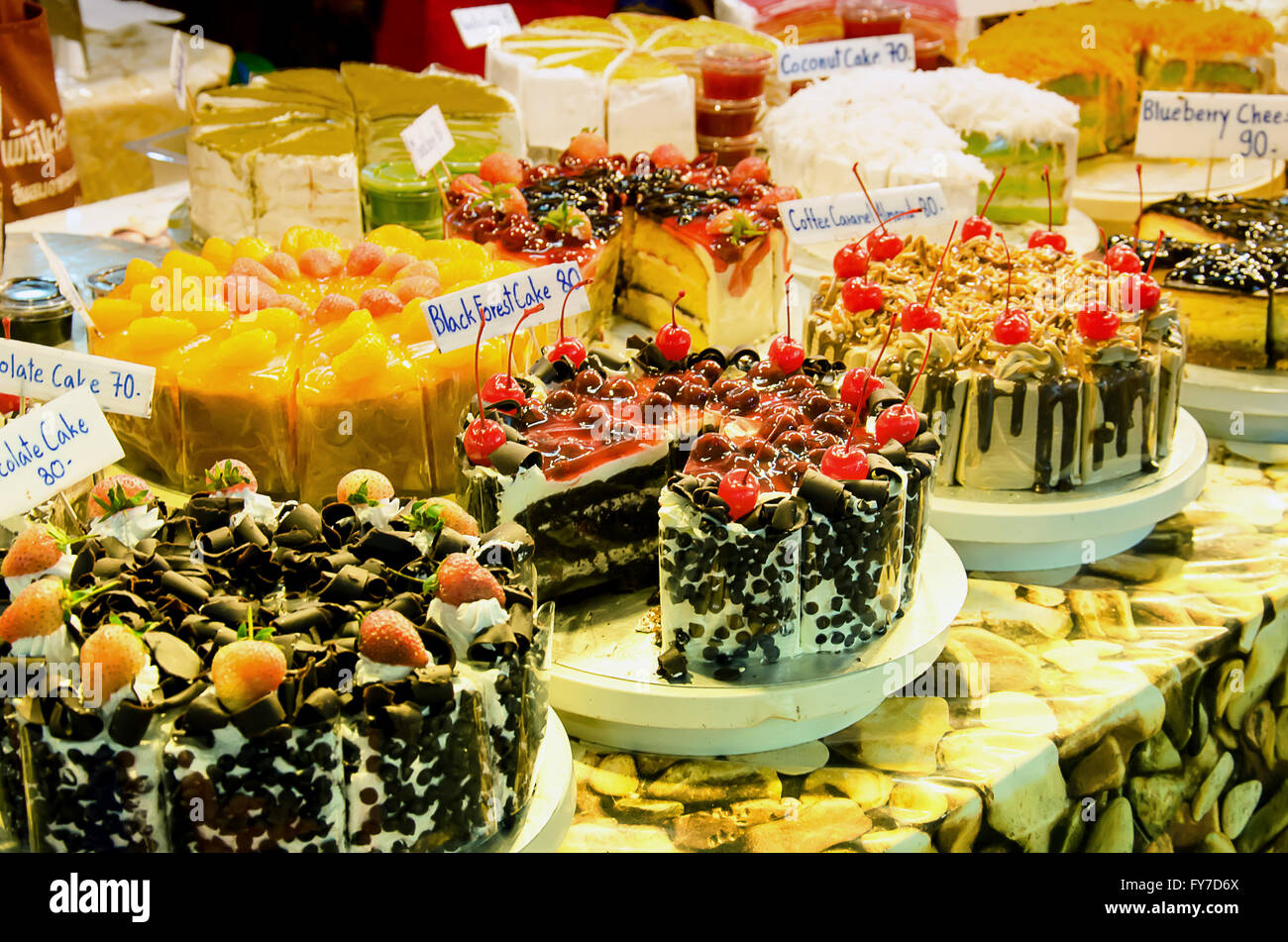 assortment of sweets on counter in market Stock Photo - Alamy