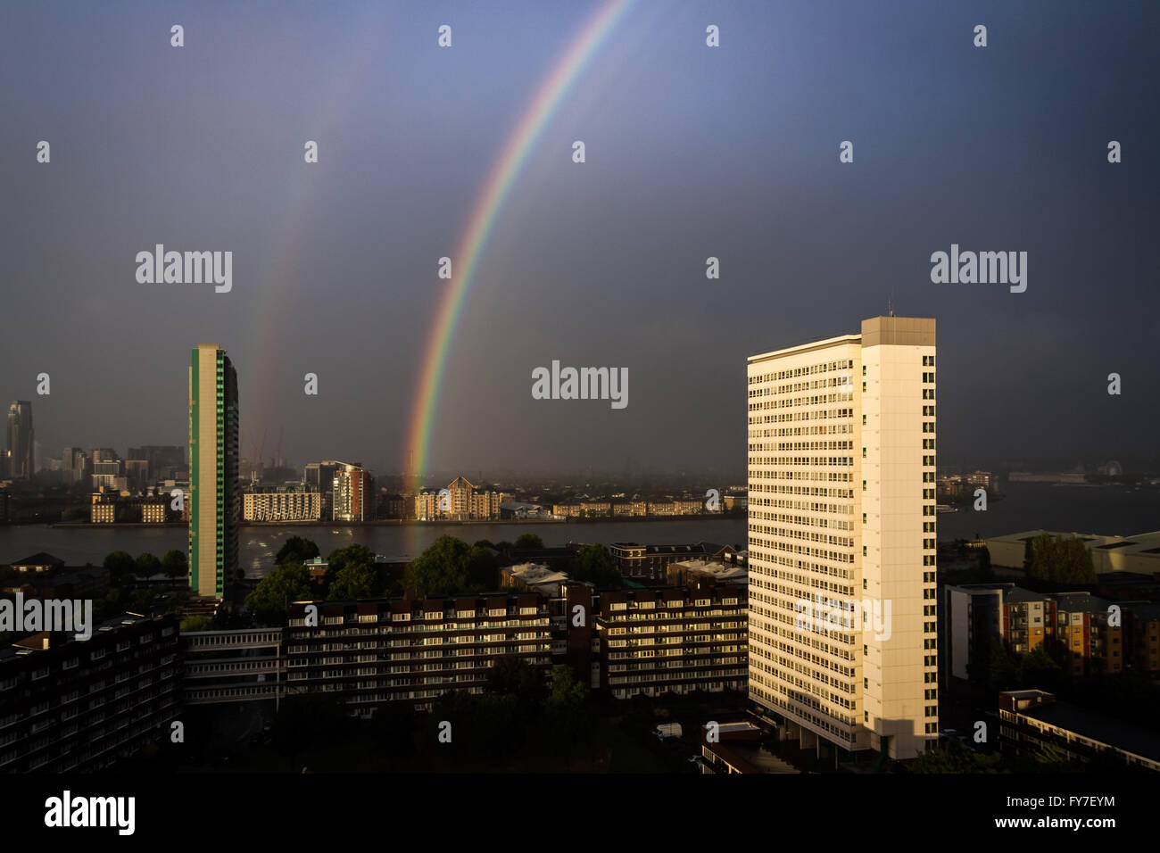 UK Weather: A colourful rainbow breaks over a south east London housing ...