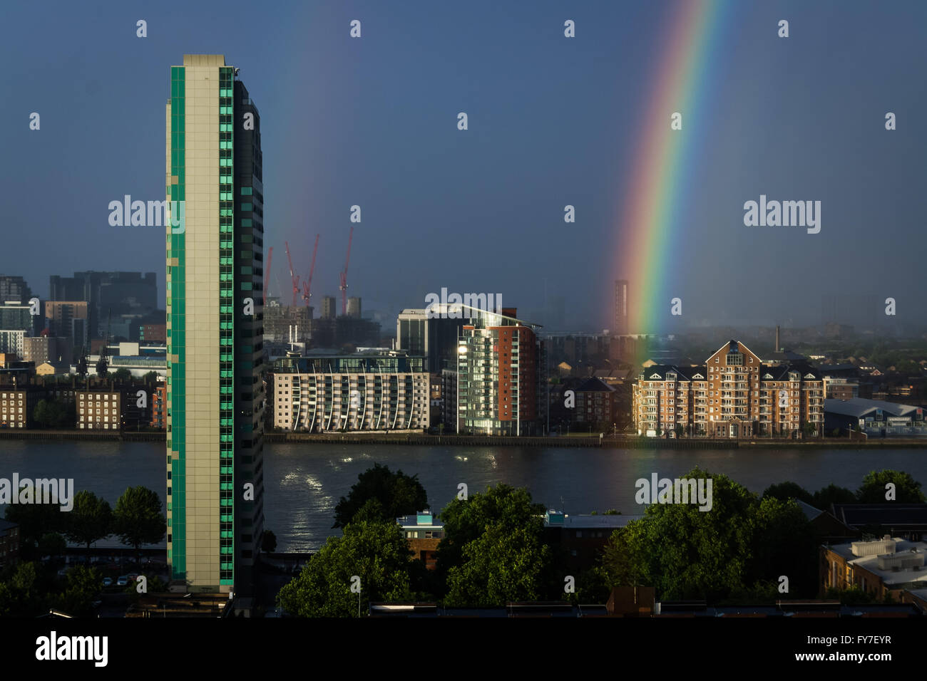 UK Weather: Colourful rainbow breaks during a brief evening rainstorm ...