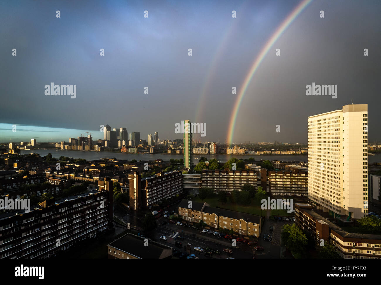 UK Weather: A colourful rainbow breaks over a south east London housing ...