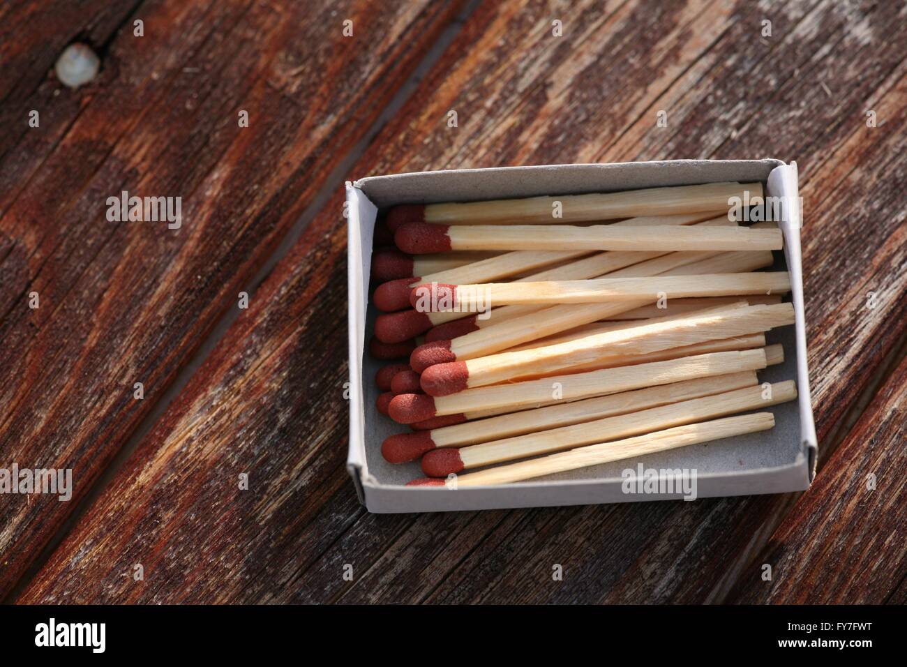 safety matches on wooden table Stock Photo - Alamy
