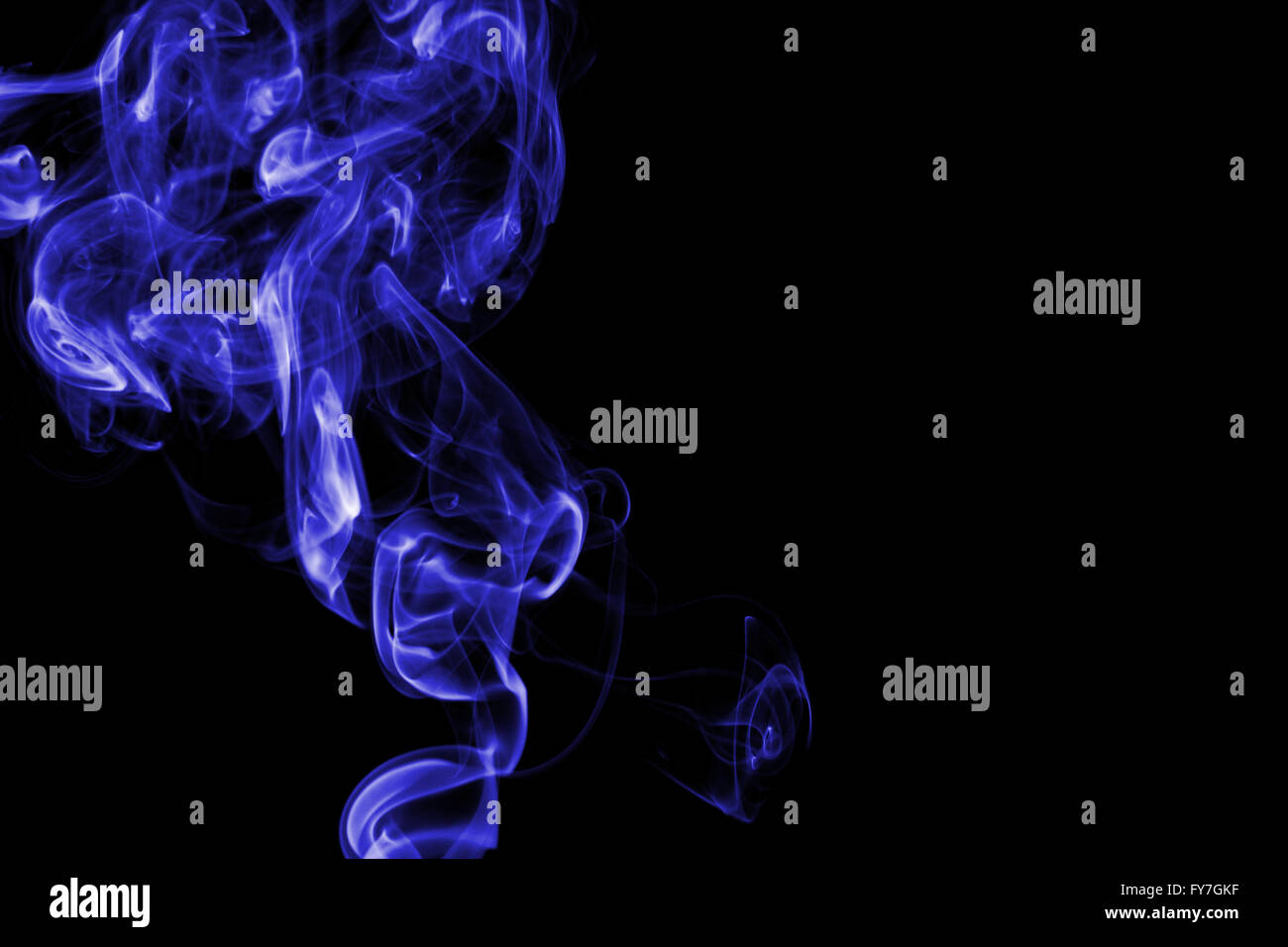 Blue smoke on black background Stock Photo - Alamy