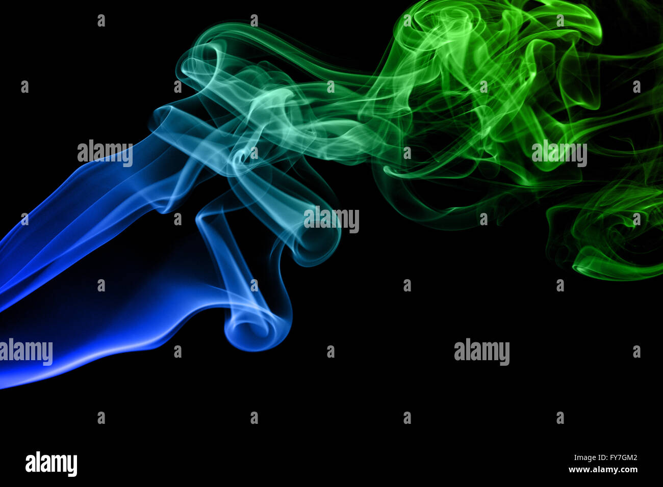 Colored smoke isolated on black background Stock Photo - Alamy