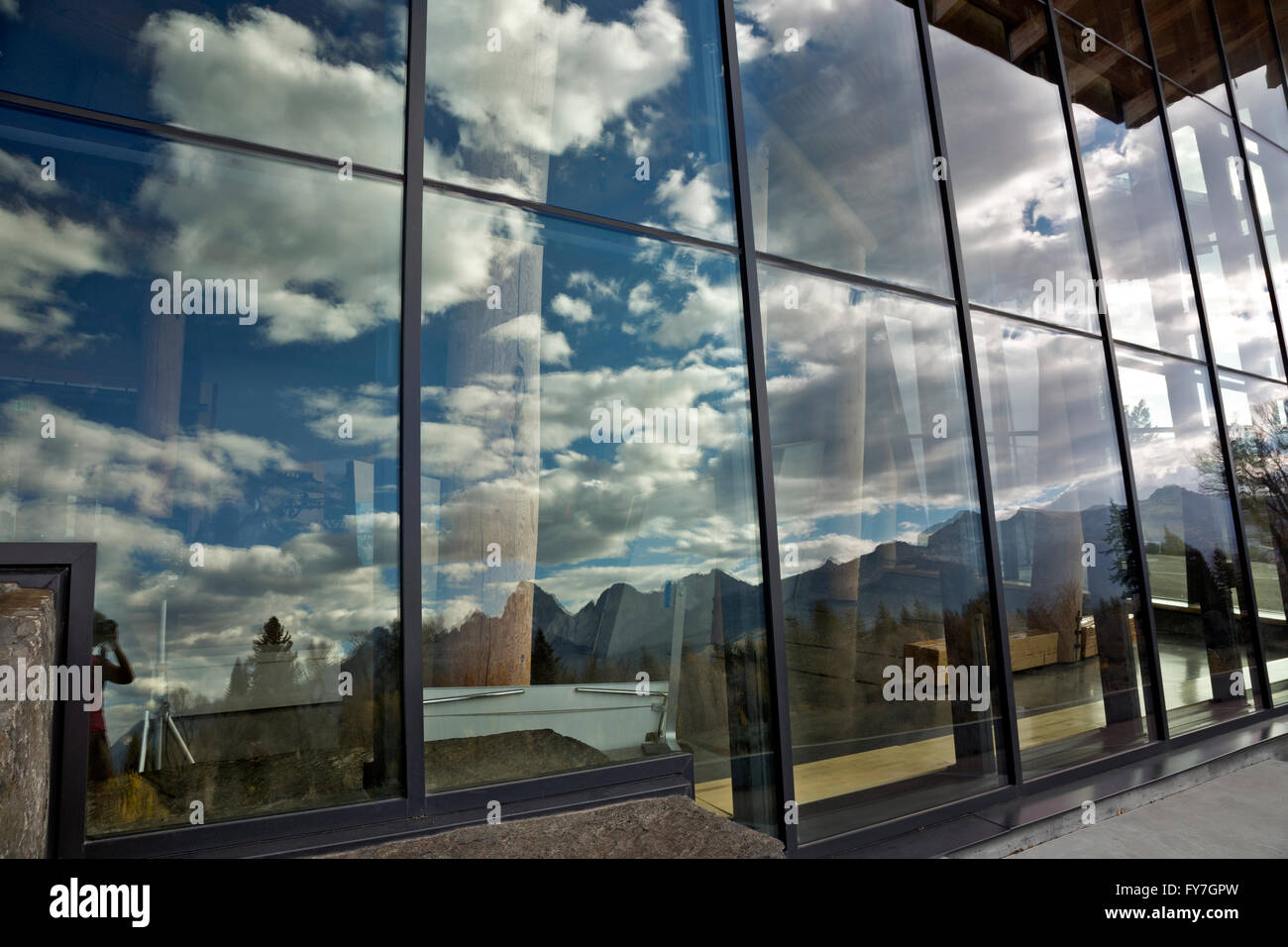 WYOMING - The Teton Mountain Range reflecting in the windows of the ...