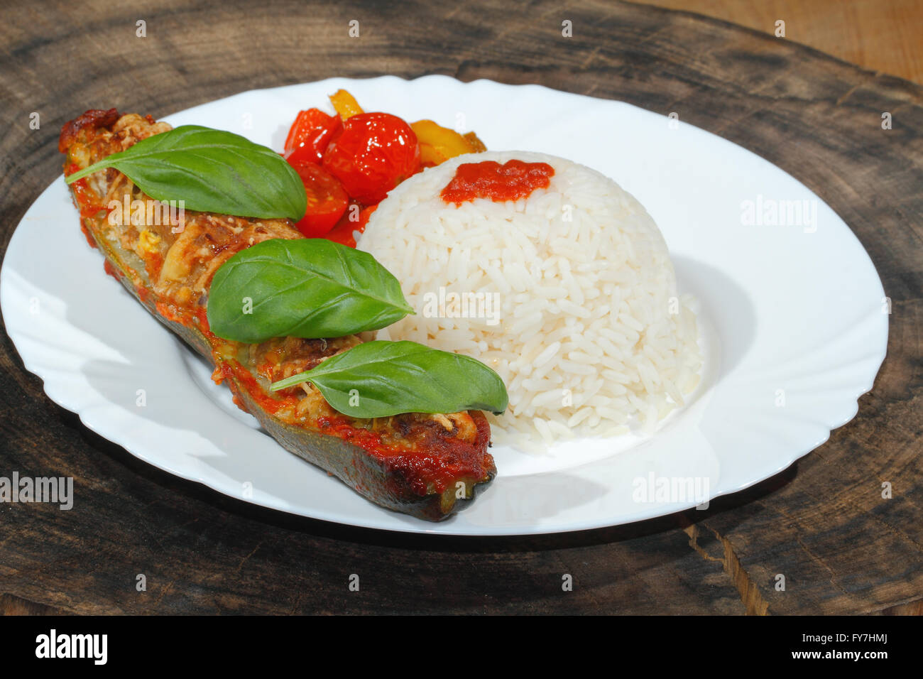 Stuffed zucchini, rice, stewed peppers and tomatoes, vegetables, side ...