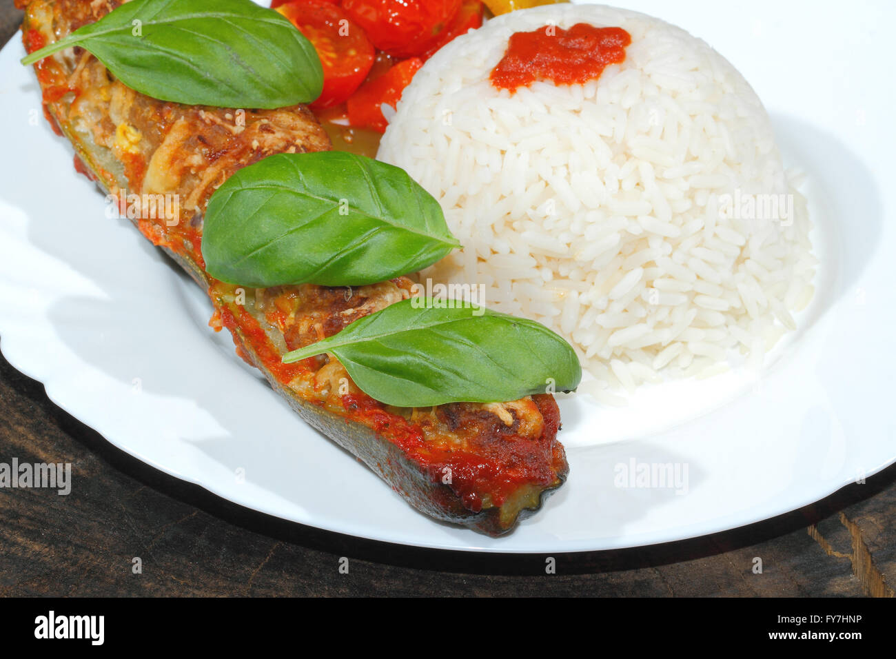 Stuffed zucchini, rice, stewed peppers and tomatoes, vegetables, side ...