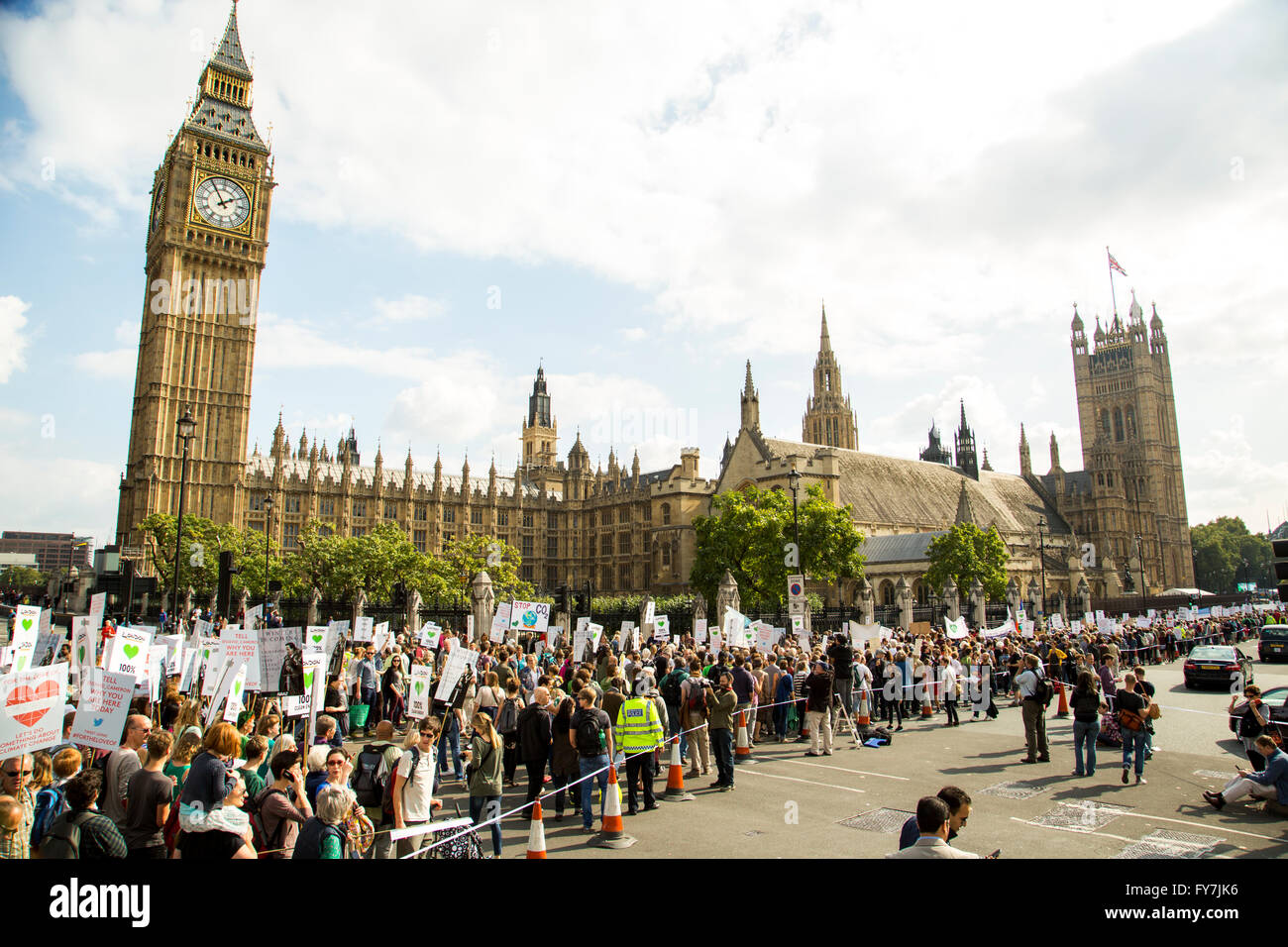 Protesters march in front of the parliament building Stock Photo - Alamy