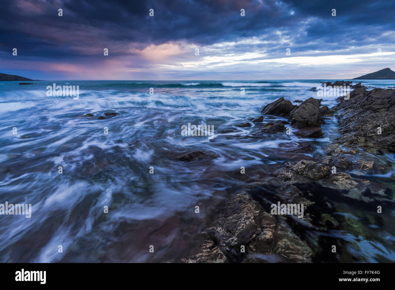 Red rocks on beach hi-res stock photography and images - Alamy