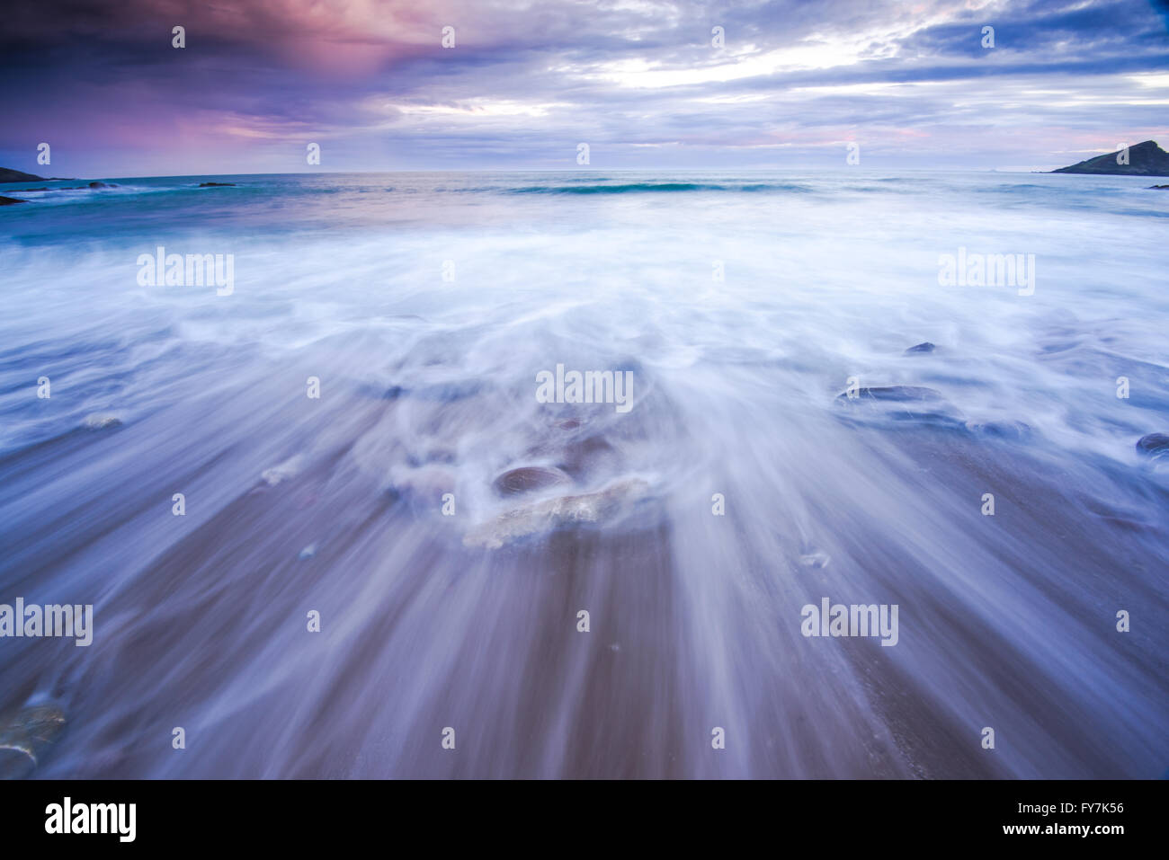 Vibrant and saturated long exposure sunset at beach in Wembury , Devon ...