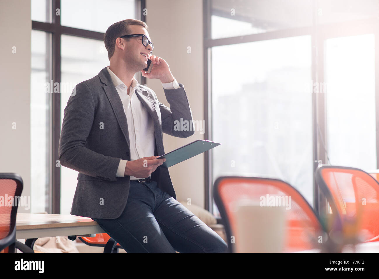 Handsome man working in the office Stock Photo - Alamy