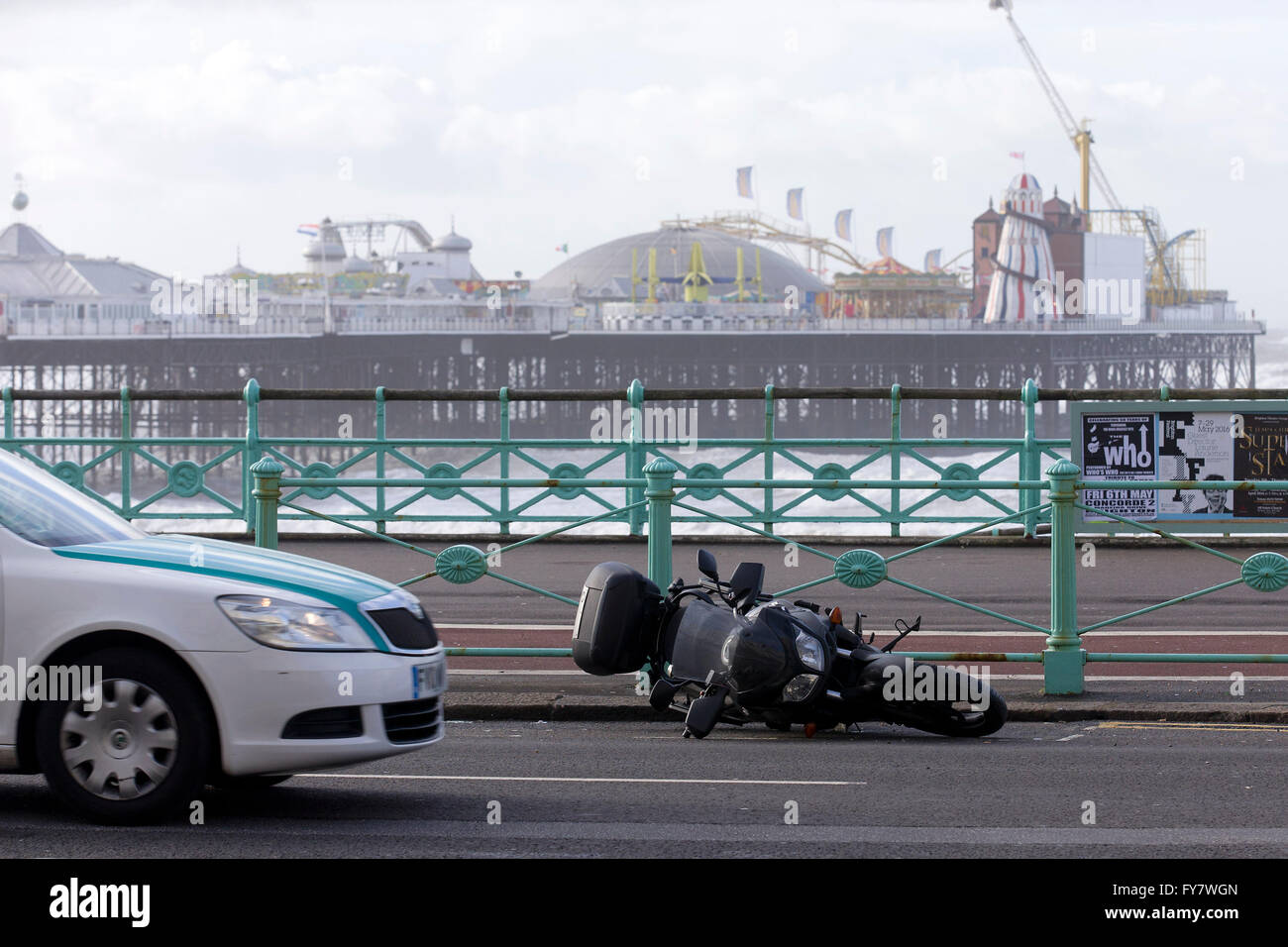Motorcycles that fell over during a storm are pictured on their sides ...