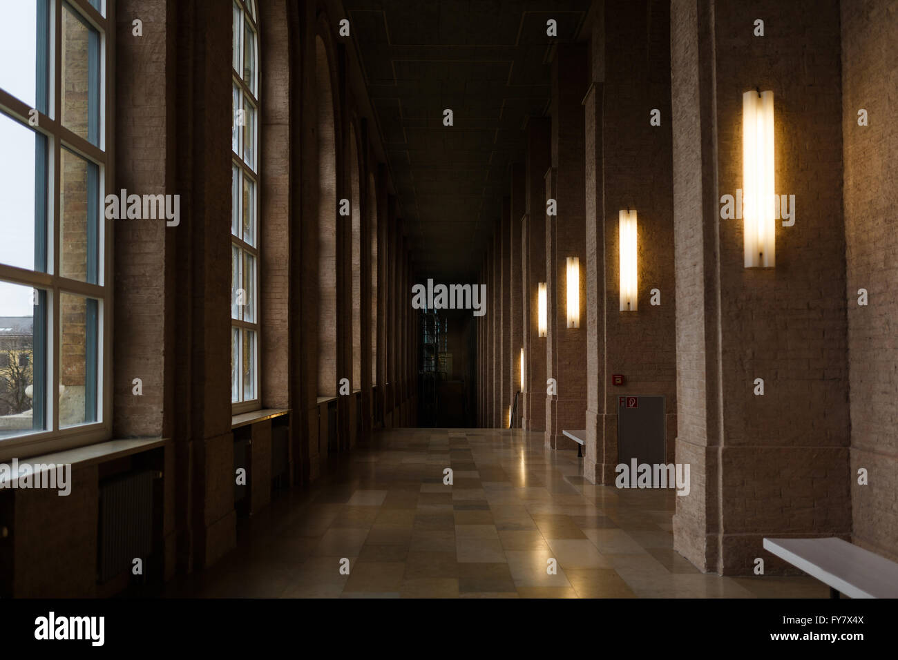 The long corridor with a high ceiling in the Alte Pinakothek museum ...