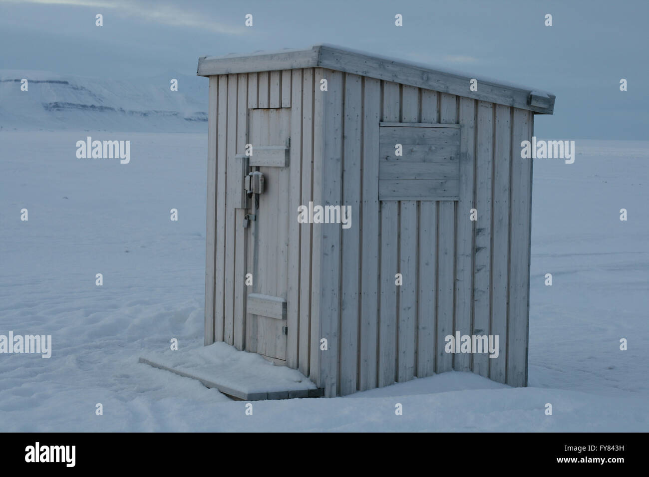 Frozen shed on the ice Stock Photo - Alamy