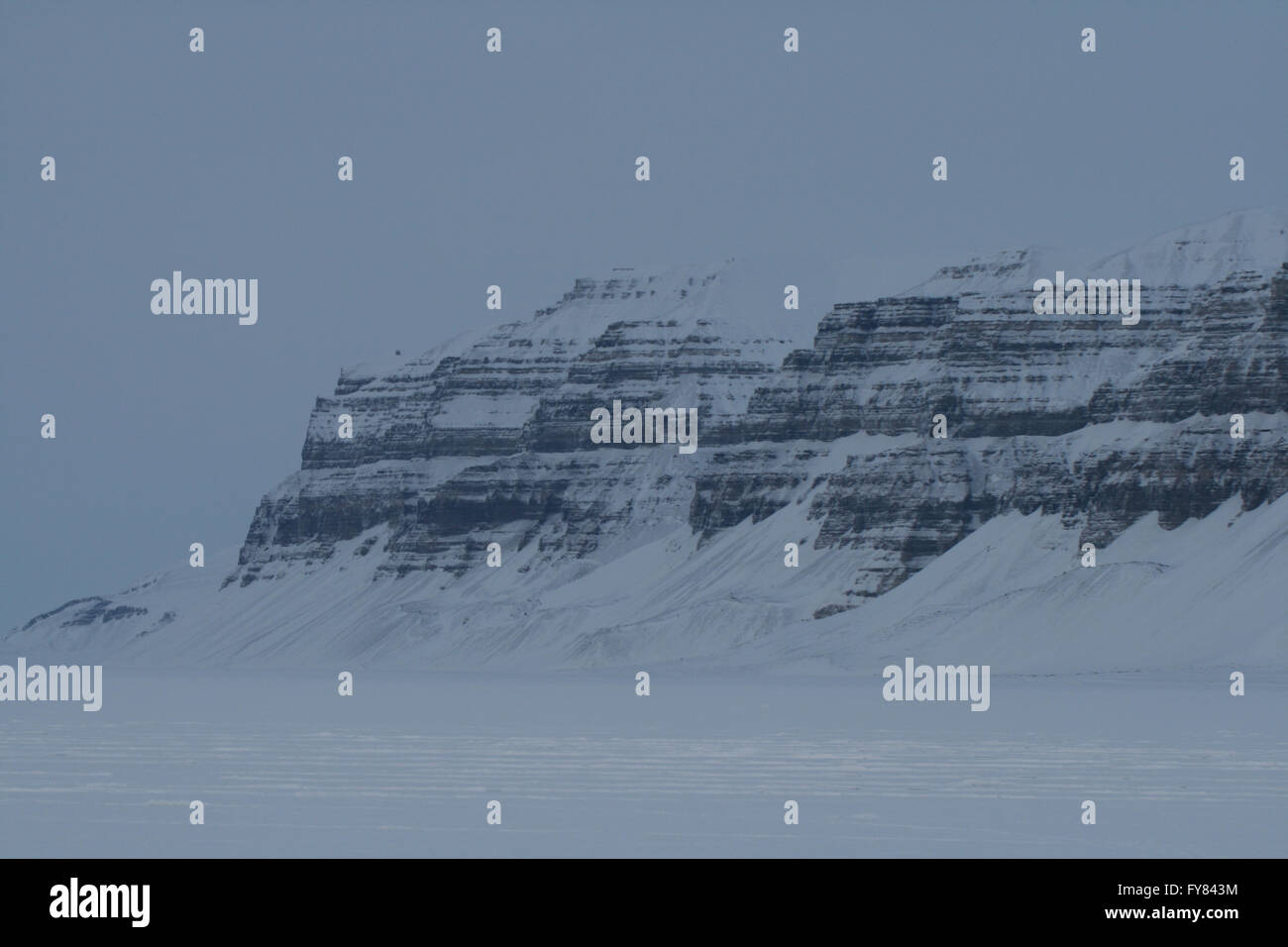 Winter mountain range in Svalbard Stock Photo - Alamy