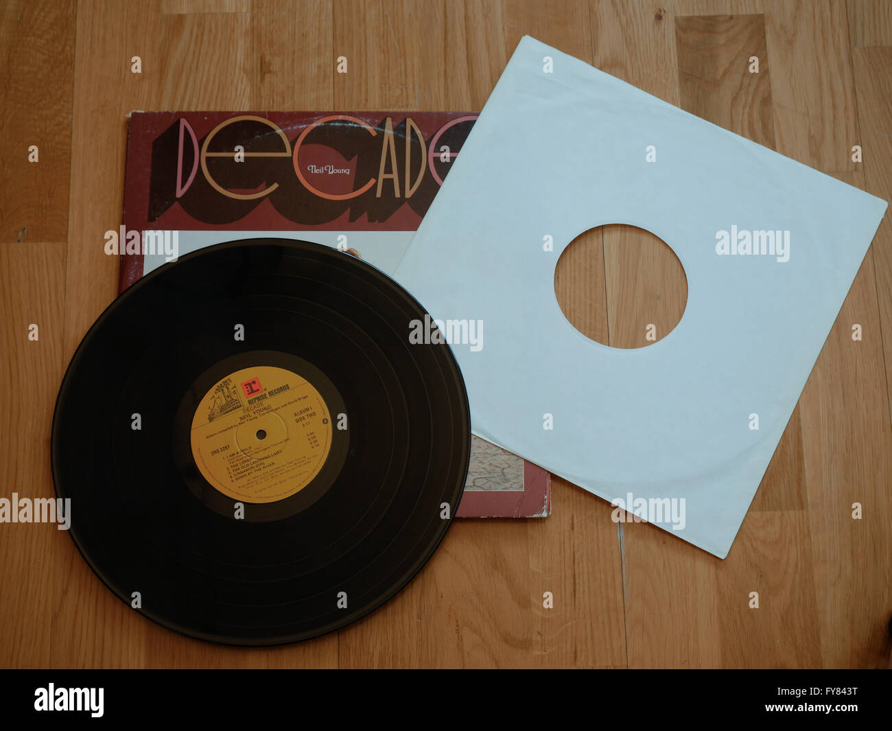 LP record with cover on the floor Stock Photo - Alamy