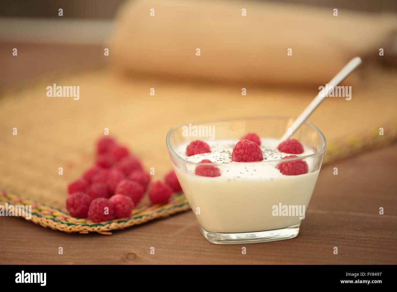 Raspberry yogurt with chia seeds Stock Photo - Alamy