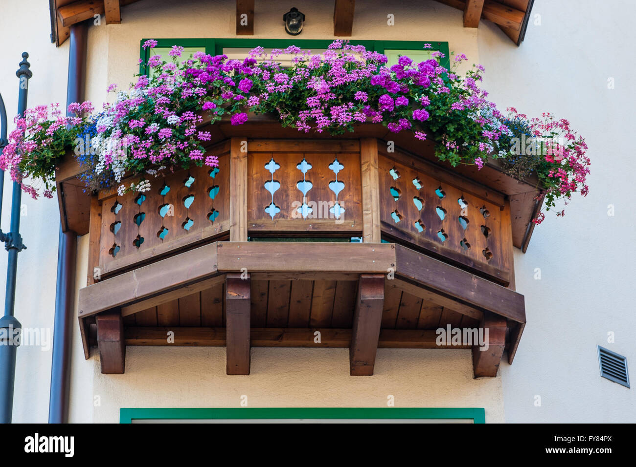 A classic wooden balcony in alps with flower box Stock Photo - Alamy