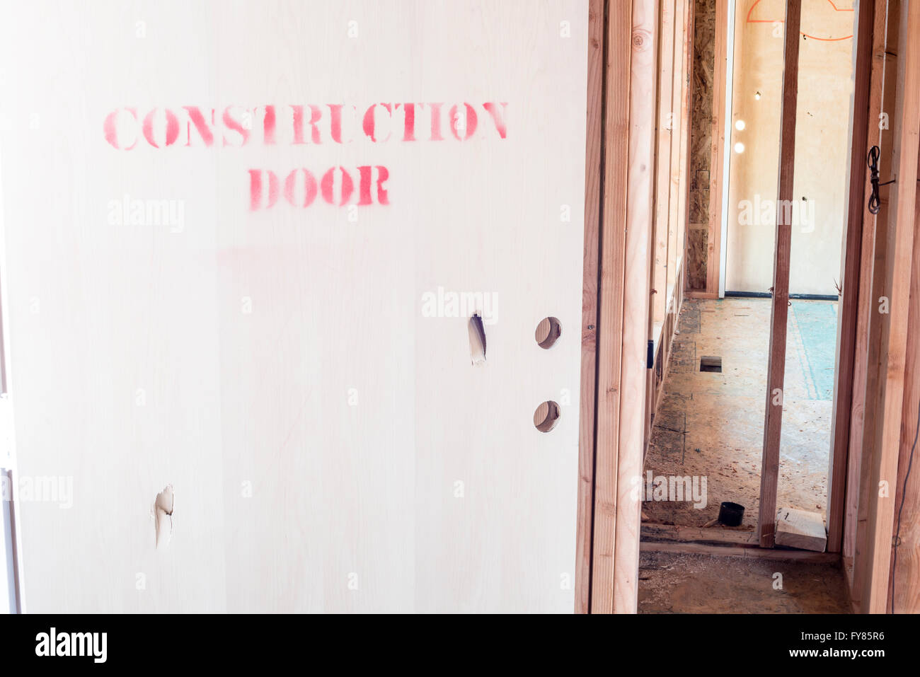 Construction door and a new home construction site Stock Photo - Alamy