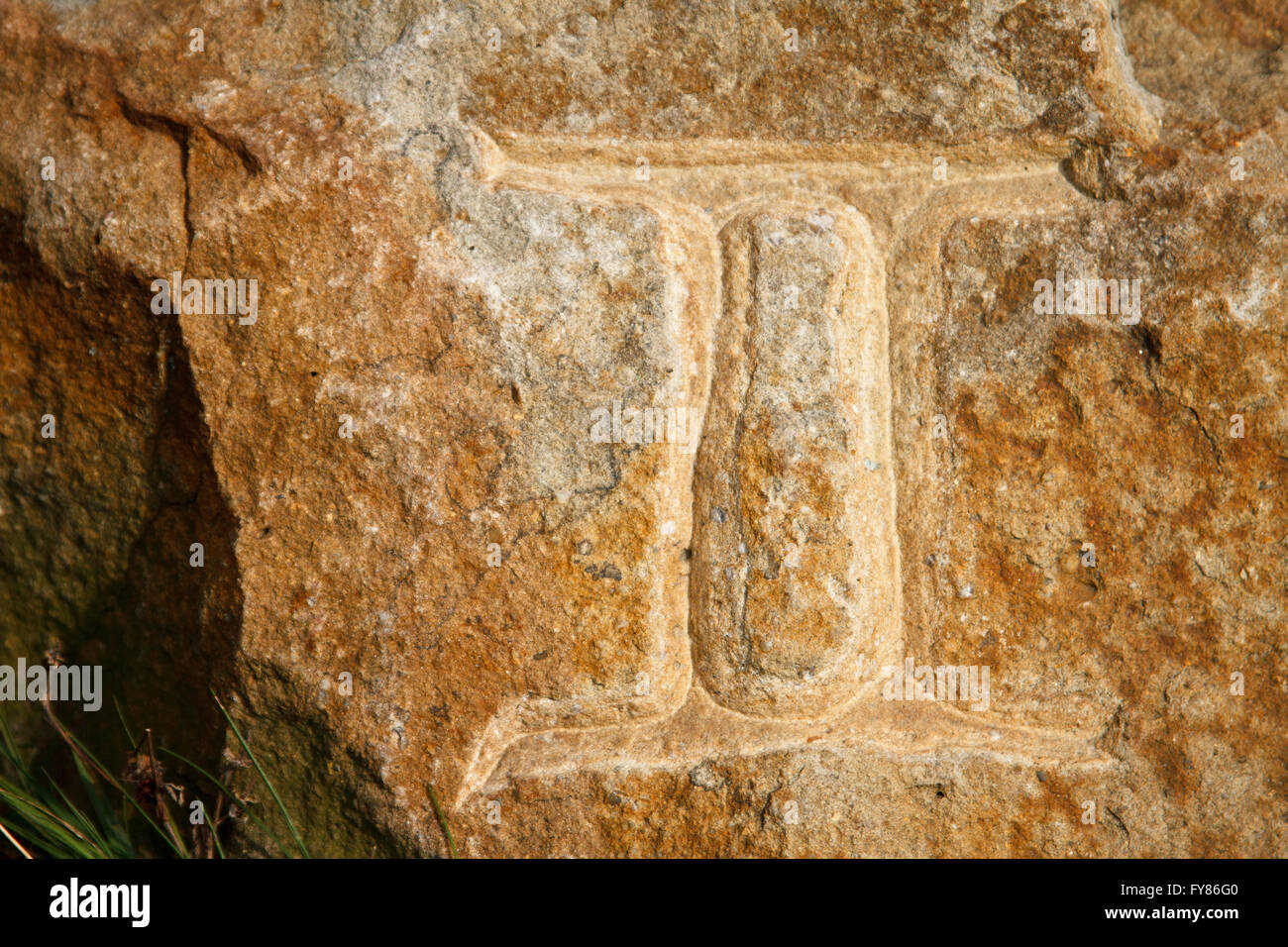 Zodiac sign of gemini engraved on sandstone rock Stock Photo - Alamy
