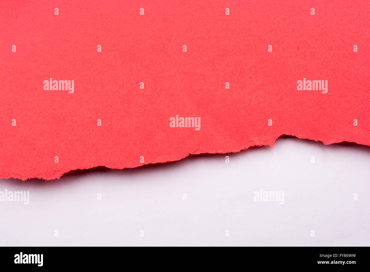 Torn sheet of paper on a background Stock Photo - Alamy