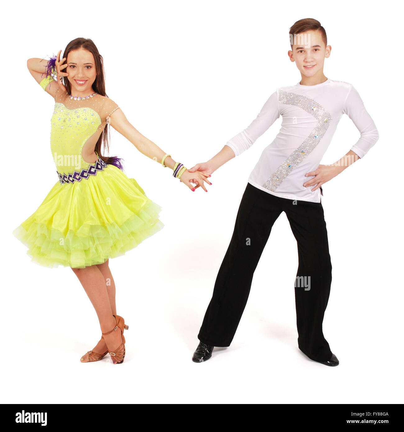 Boy and girl dancing ballroom dance on white background Stock Photo - Alamy