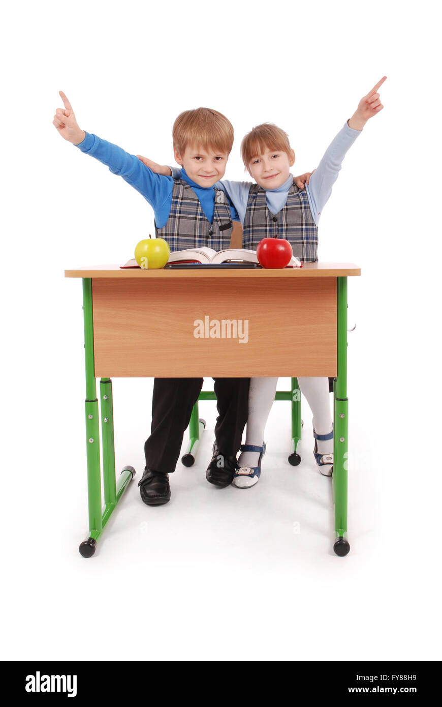 Boy and girl raising hand to ask question isolated on white Stock Photo ...