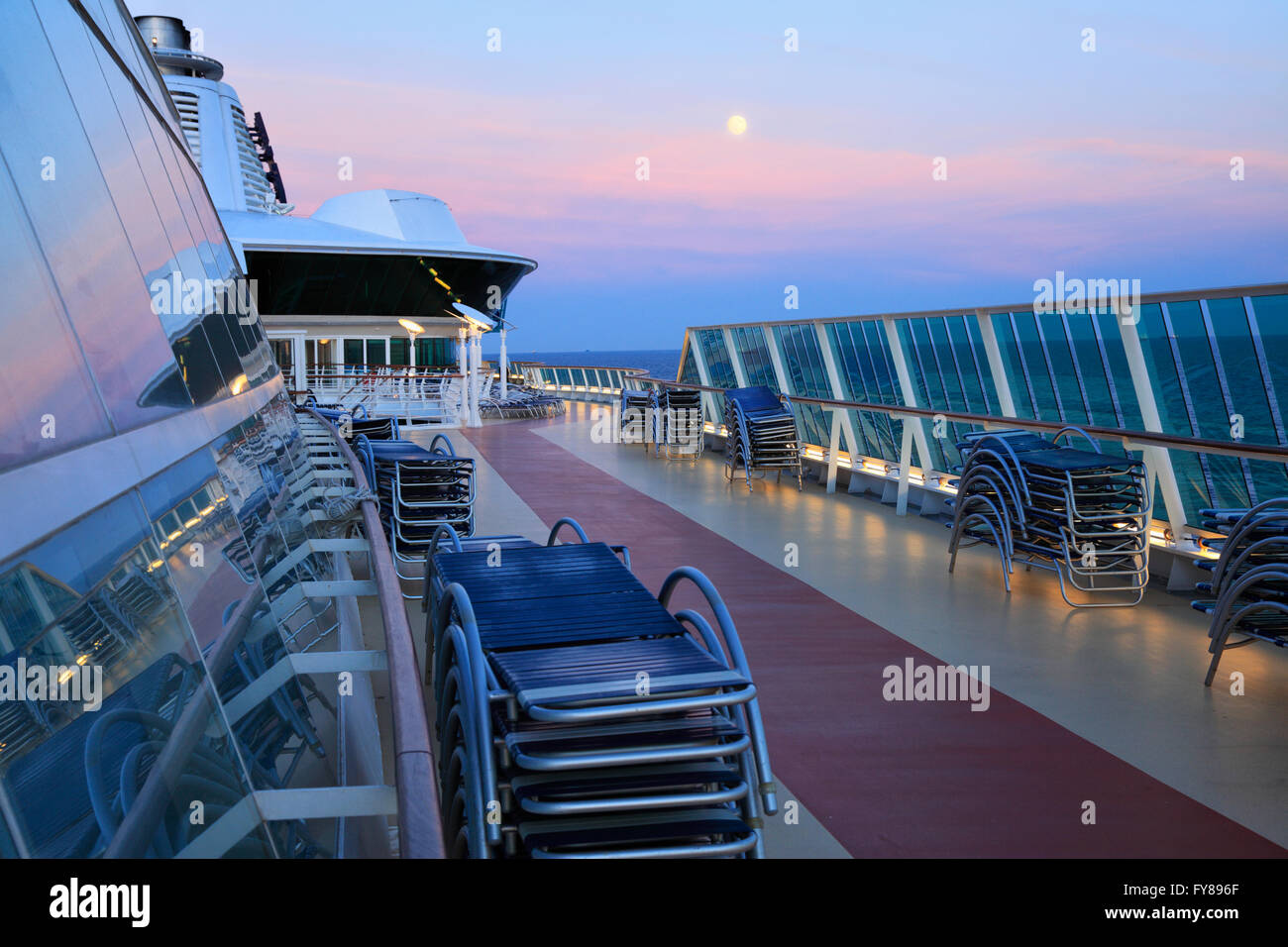Moon rise over the deck of the cruise ship Brilliance of the Seas ...
