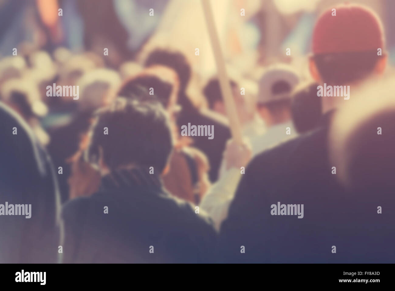 Blur unrecognizable crowd at political meeting, cheering audience ...
