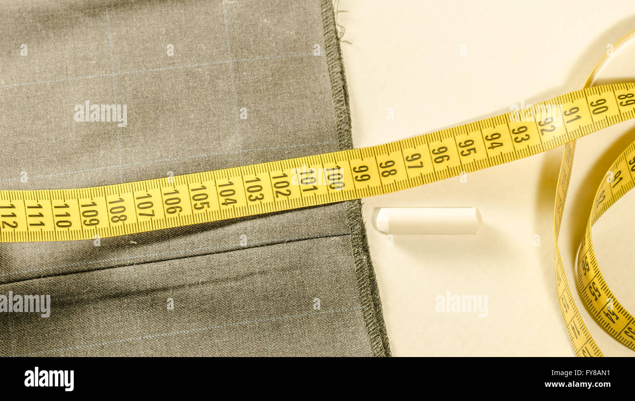 still life with a tape measure a chalk and tissue Stock Photo - Alamy