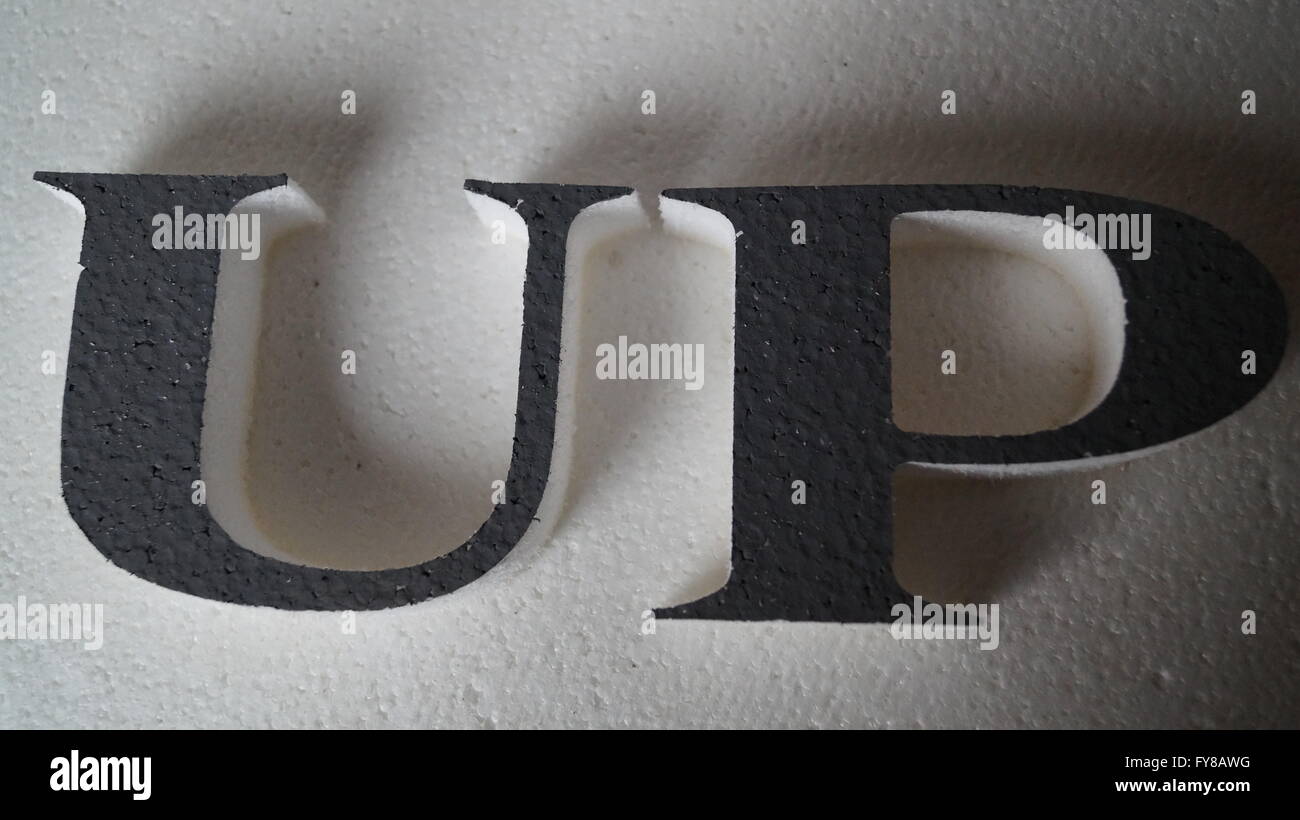 The word UP signage from polystyrene Stock Photo - Alamy