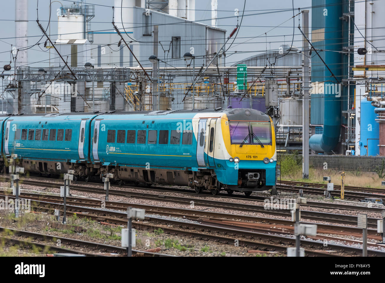 An Arriva DMU diesel train passing through Warrington Bank Quay station ...