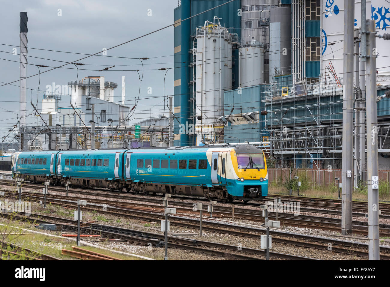 An Arriva DMU diesel train passing through Warrington Bank Quay station ...