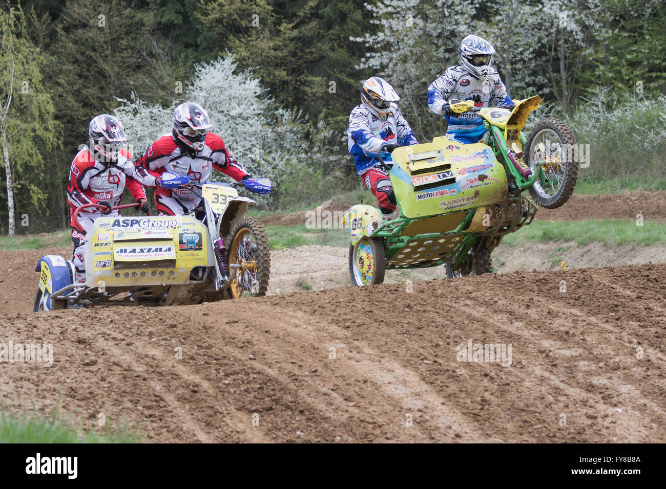 Clash of two crew in difficult muddy terrain in the sidecar race Stock ...