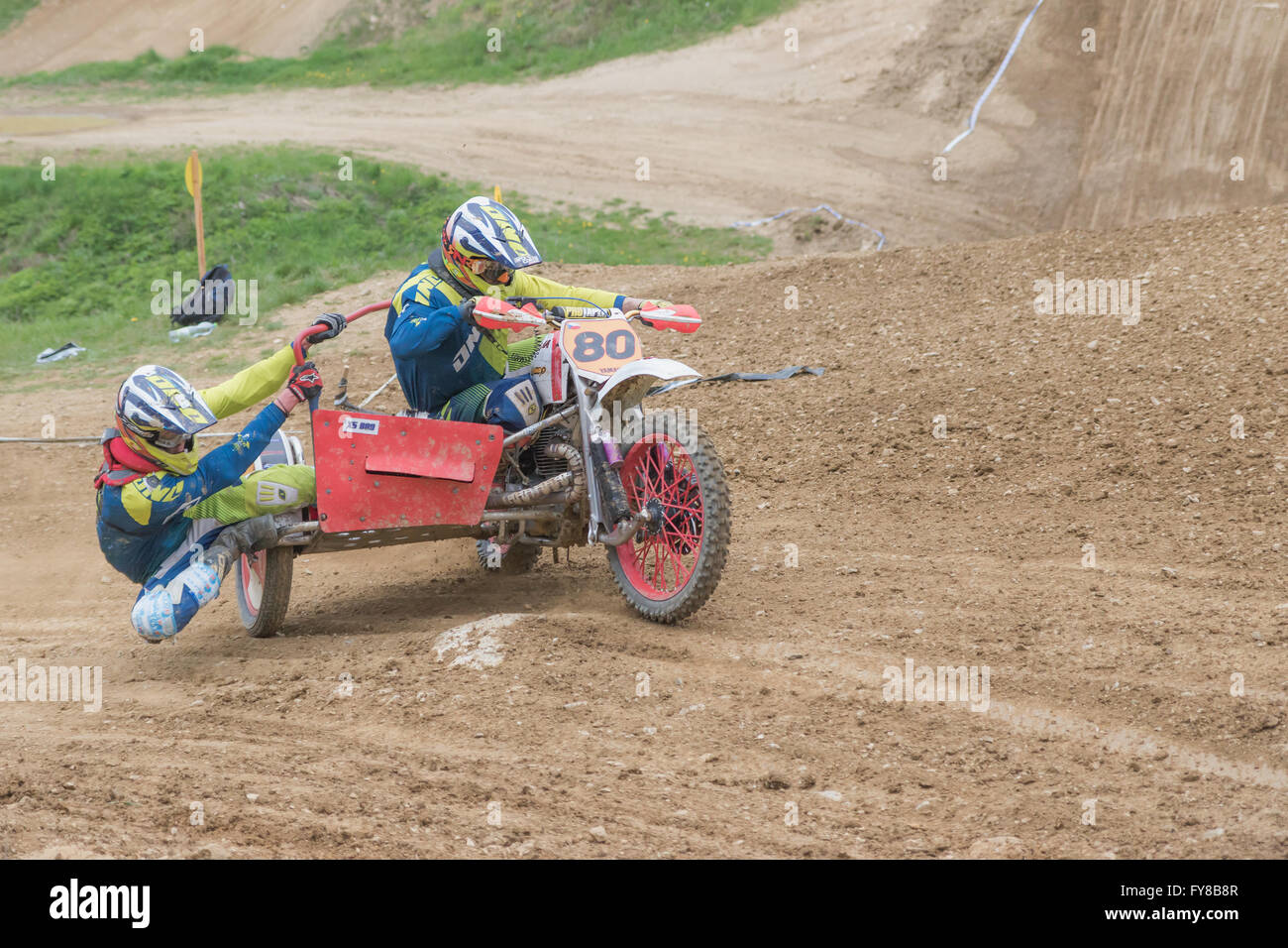 Two racers are riding a sidecar in the turn in the race Stock Photo - Alamy