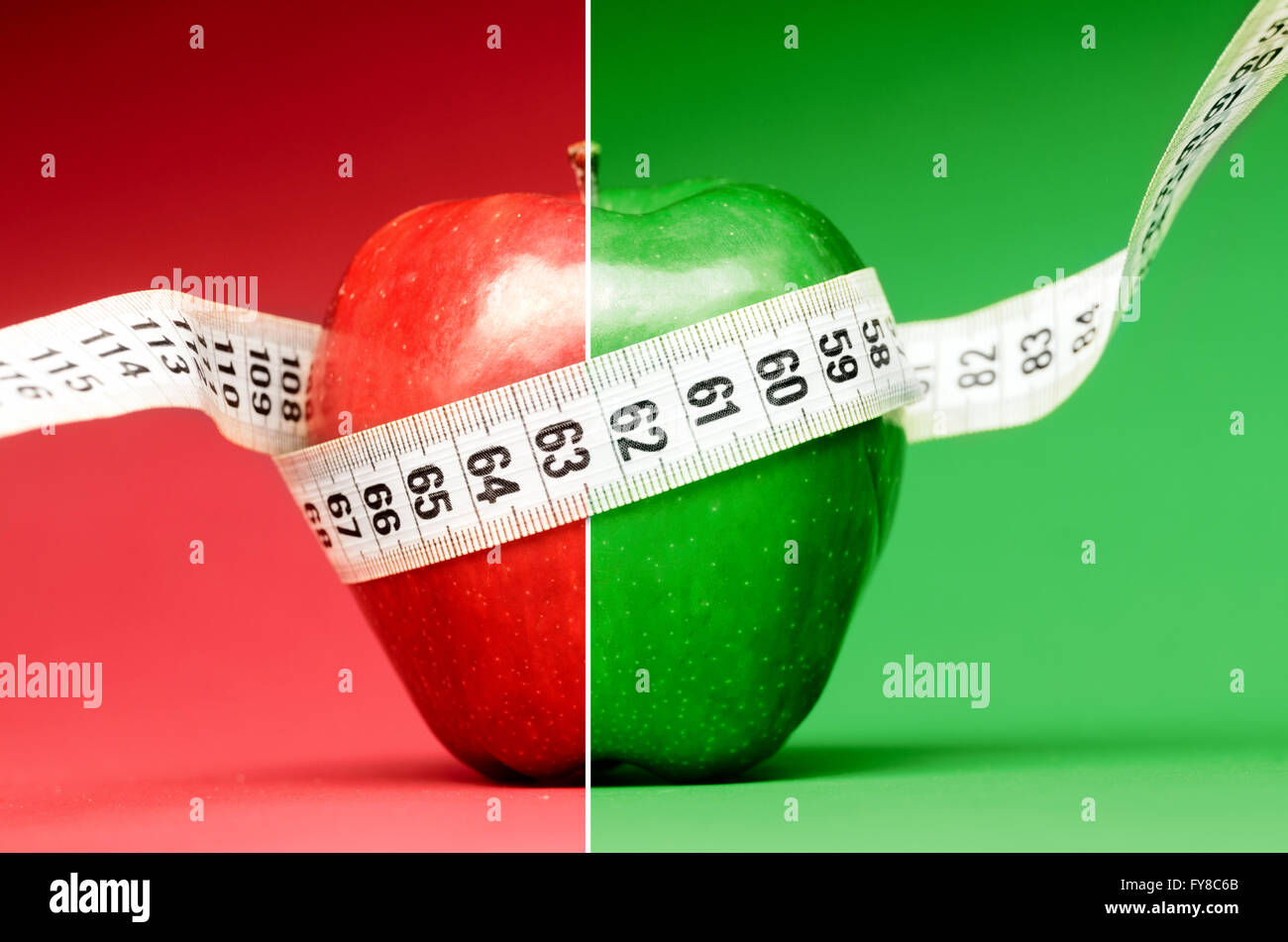 Delicious apple with measuring tape Stock Photo - Alamy