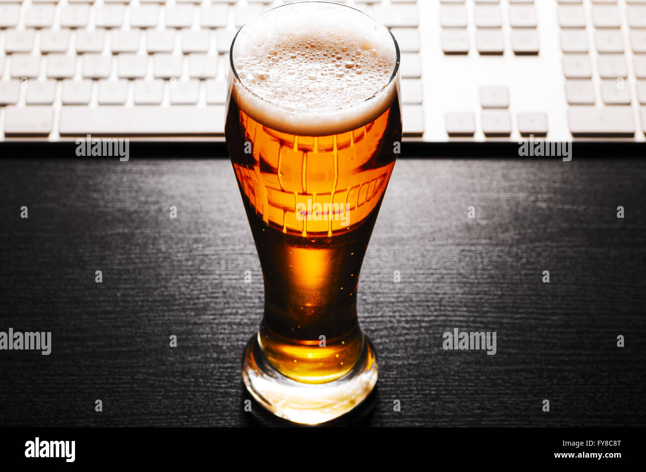 glass of lager beer on table Stock Photo - Alamy